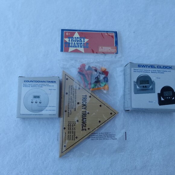 Swivel | Games | Bundle Tricky Triangle Gamebrain Teasers Quartz Clocks ...